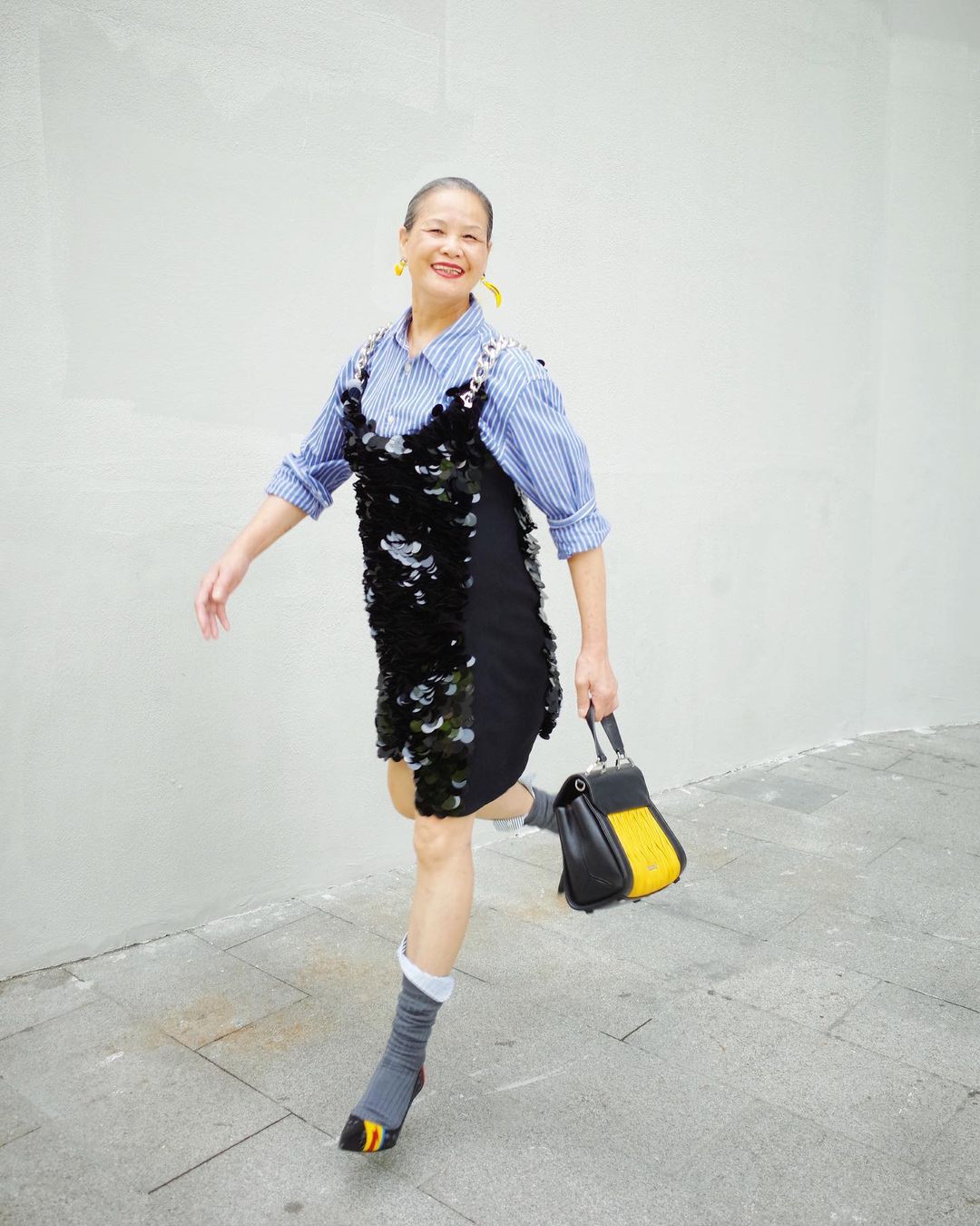 70 Year Old Model Qin Huilan Walks For Miu Miu Fall/Winter 2024